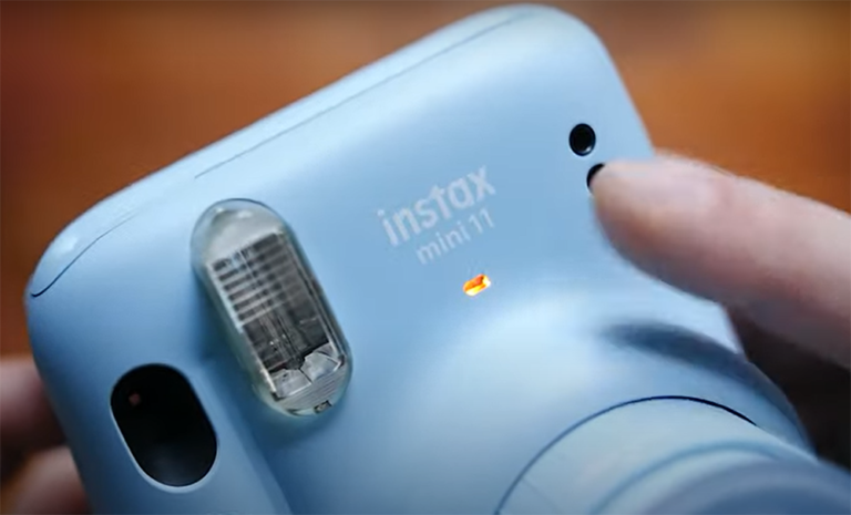 Why Is My Polaroid Flashing Orange? - FotoProfy